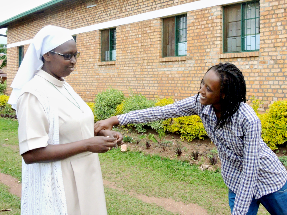 Raised by sisters, a Rwandan orphan looks to the future | Global ...